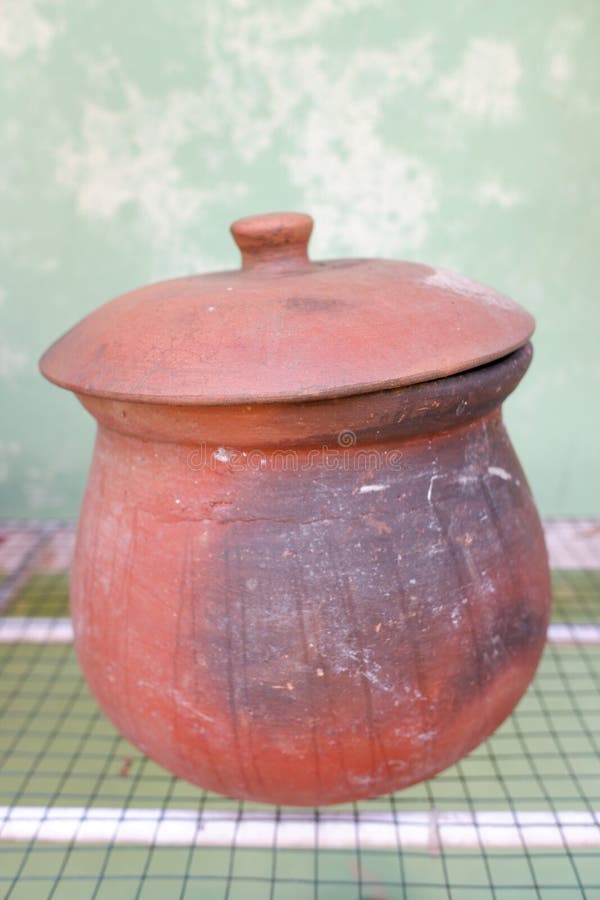 A clay pot stock image. Image of artist, potter, creativity - 306462143