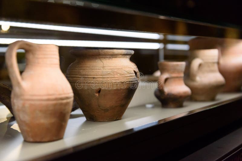 Clay Pots and Pitchers on the Shelf Stock Image - Image of rustic ...