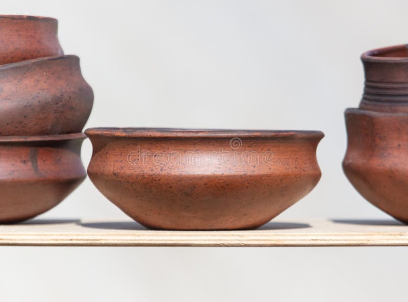 Clay Pots on the Shelf in the Store, Closeup of Photo Stock Photo ...