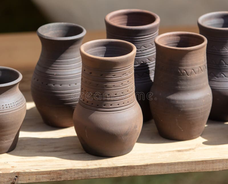 Clay Pots on the Shelf in the Store, Closeup of Photo Stock Image ...