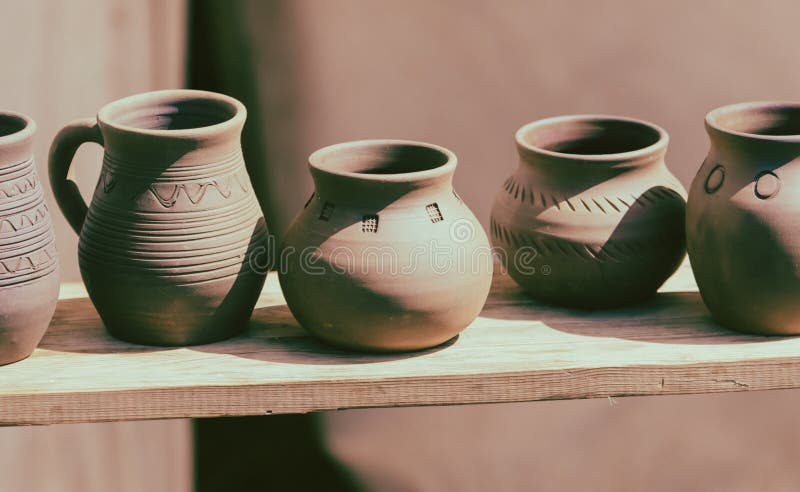 Clay Pots on the Shelf in the Store, Closeup of Photo Stock Image ...