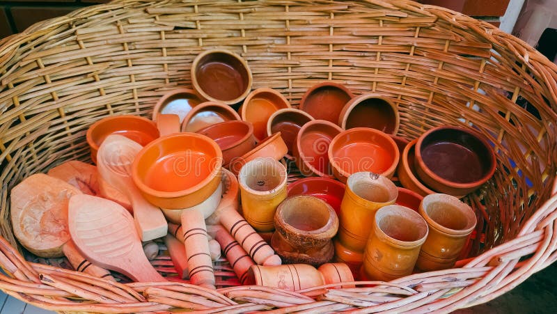 Clay Pots and Wooden Products in a Wicker Basket Stock Image - Image of ...