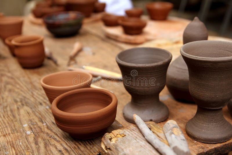 Clay Pottery Handcrafts on Vintage Table Stock Image - Image of table ...