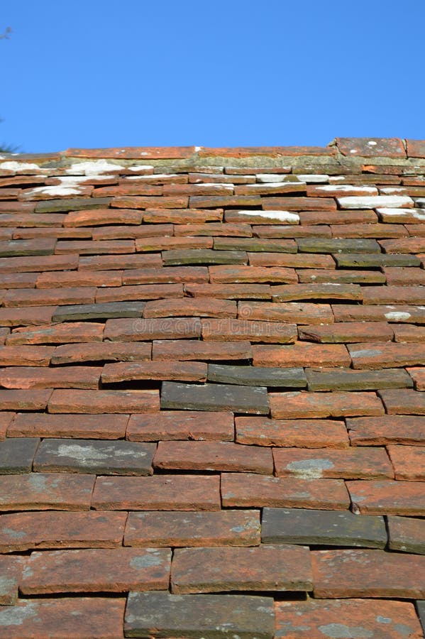 Clay roof tiles. stock photo. Image of terracotta, blue - 69506438