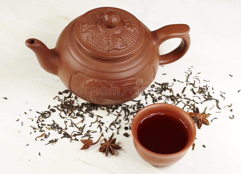Clay Teapot, Bowl, Tea and Star Anise Stock Image - Image of anise ...