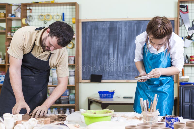 Claymaking Process Concept. Two Professional Ceramists during a Process ...