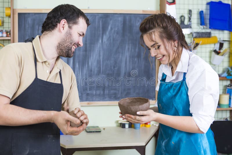 Claymaking Process Concept. Two Professional Ceramists during a Process ...