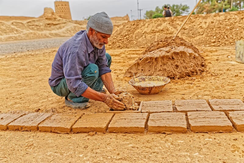 Clayman making bricks editorial stock image. Image of castle - 177141114