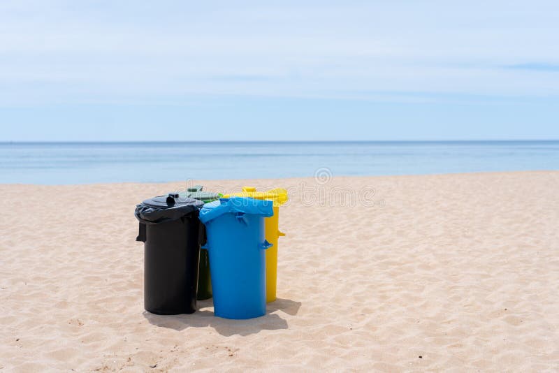 Clean beach garbage bins stock image. Image of place - 254312561