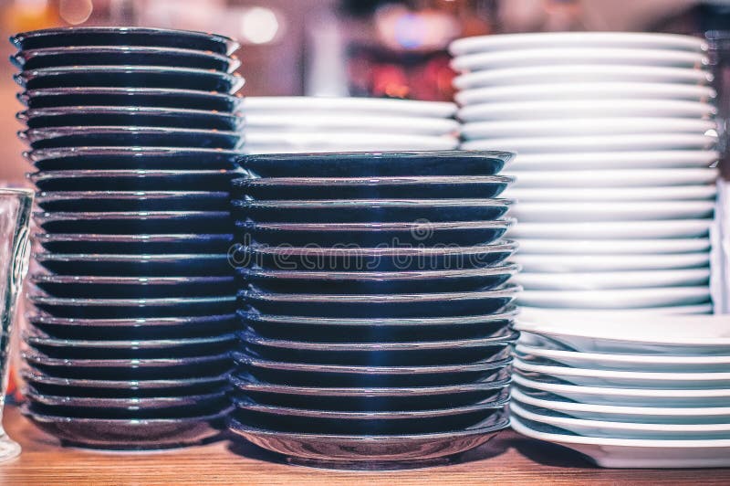 Clean Black and White Plates are Stacked on the Table Stock Image ...