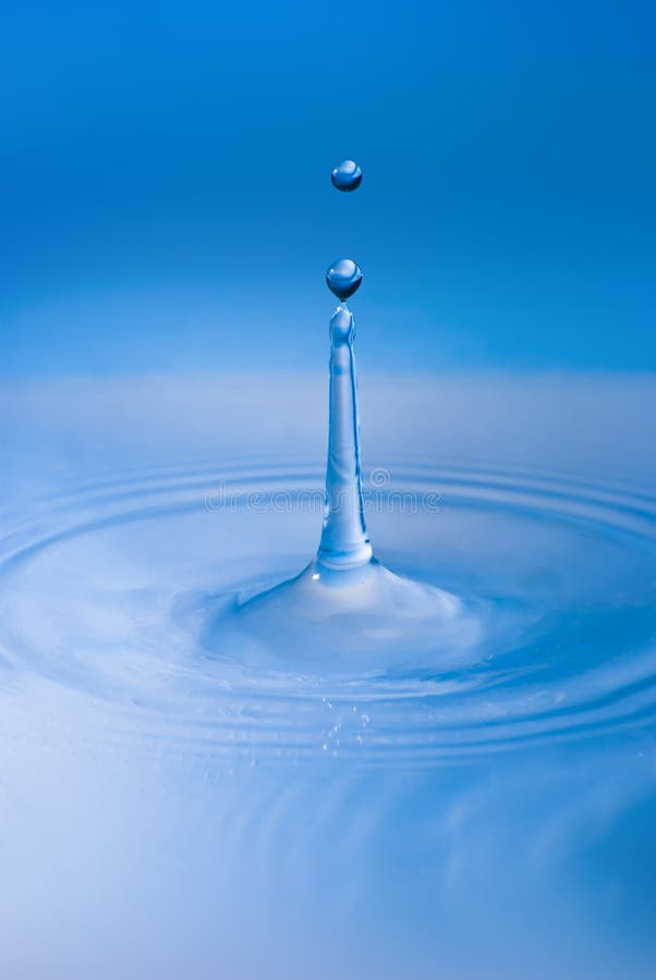 Clean Blue Drop of Water Splashing in Clear Water Stock Image - Image ...