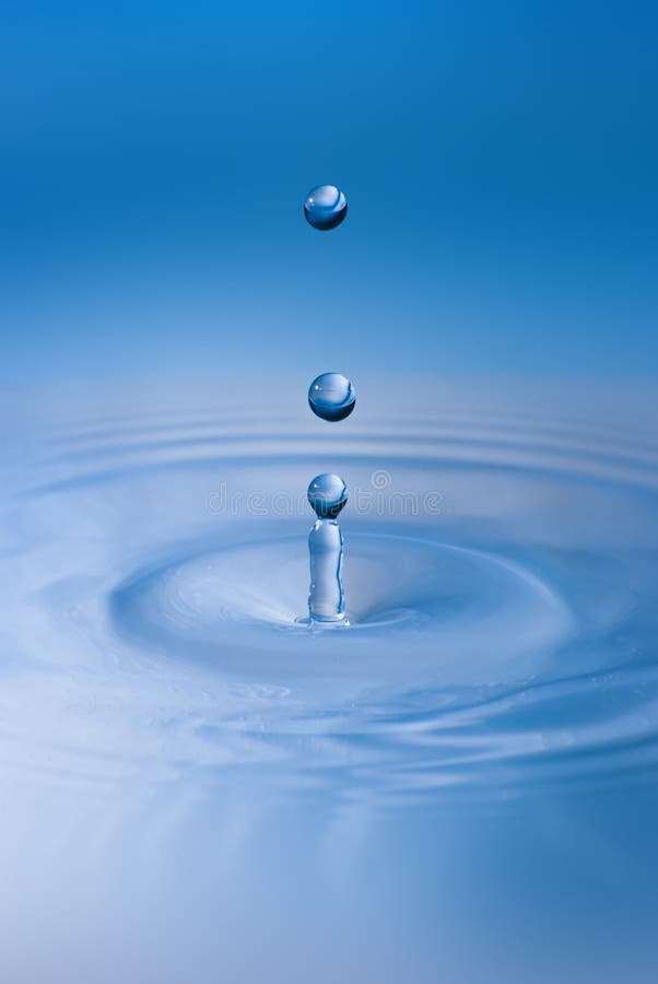 Clean Blue Drop of Water Splashing in Clear Water Stock Image - Image ...