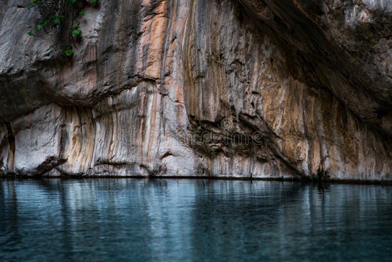Clean Blue River with Rocky Banks at the Bottom of a Deep Canyon Stock ...