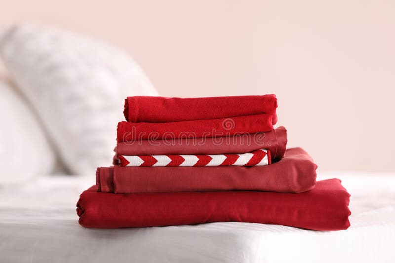 Clean Color Folded Linens on Bed Indoors Stock Photo - Image of color ...