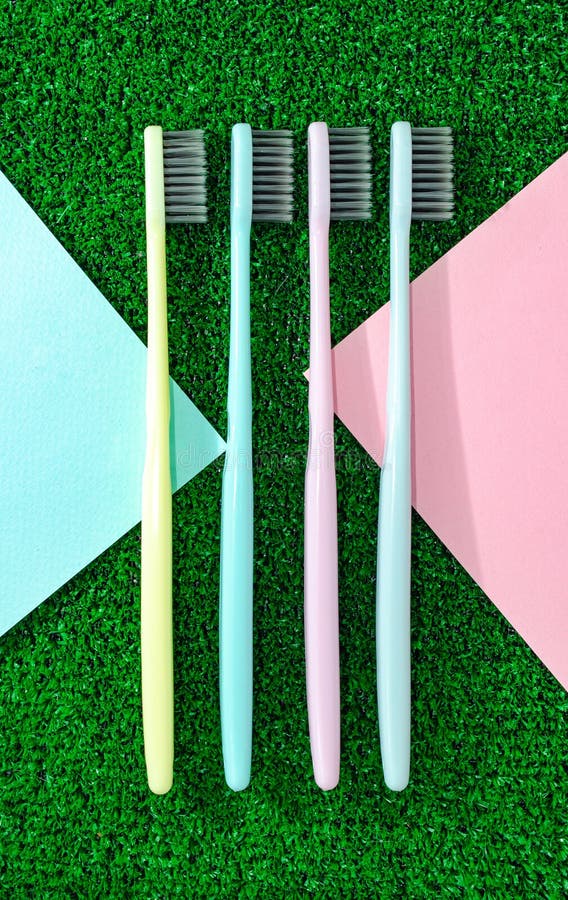 Clean Colorful Toothbrushes on Green Grass Stock Photo - Image of ...
