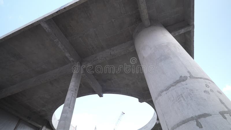 Contemporary Concrete Architecture Beneath a Raised Elevated Structure ...