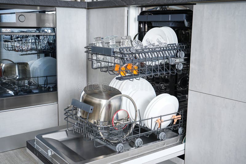 Clean Dishes in the Dishwasher in the Kitchen. Front View Stock Image ...