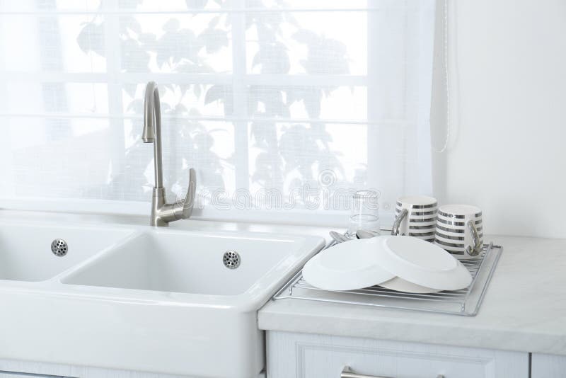 Clean Dishes Drying on Rack in Kitchen Stock Photo - Image of porcelain ...