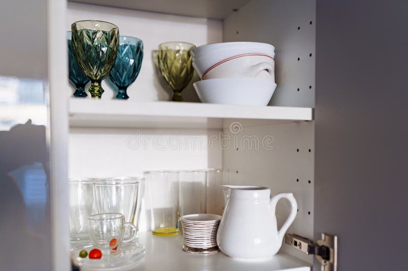 Clean Dishes and Tableware on White Shelf Stock Photo - Image of teapot ...