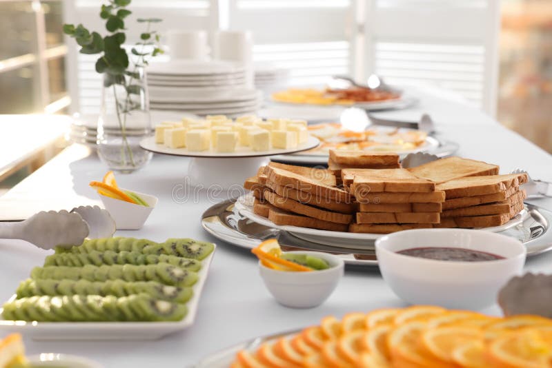 Clean Dishware and Different Meals for Breakfast on White Table Indoors ...