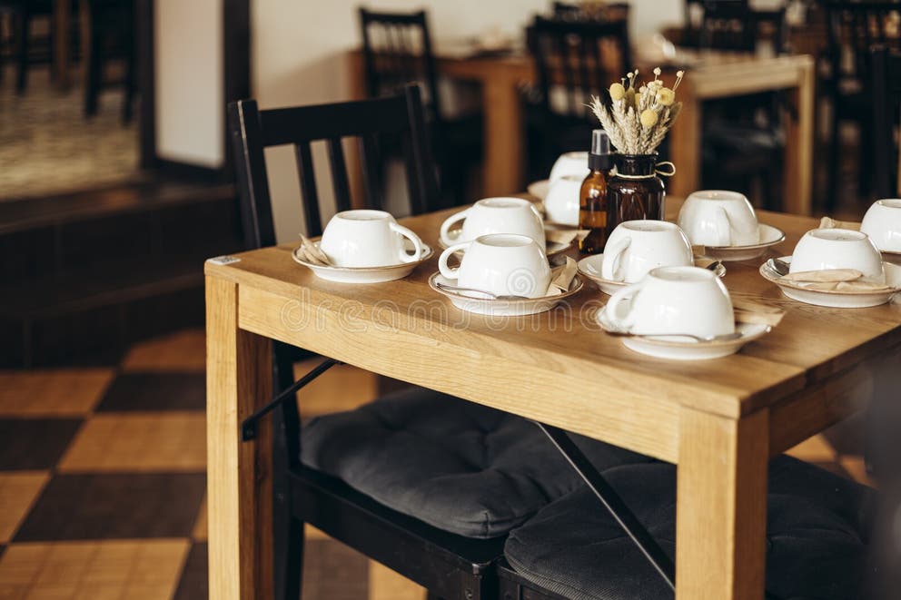 Clean Empty Cups on a Table in a Restaurant, Clean Overturned Dishes ...