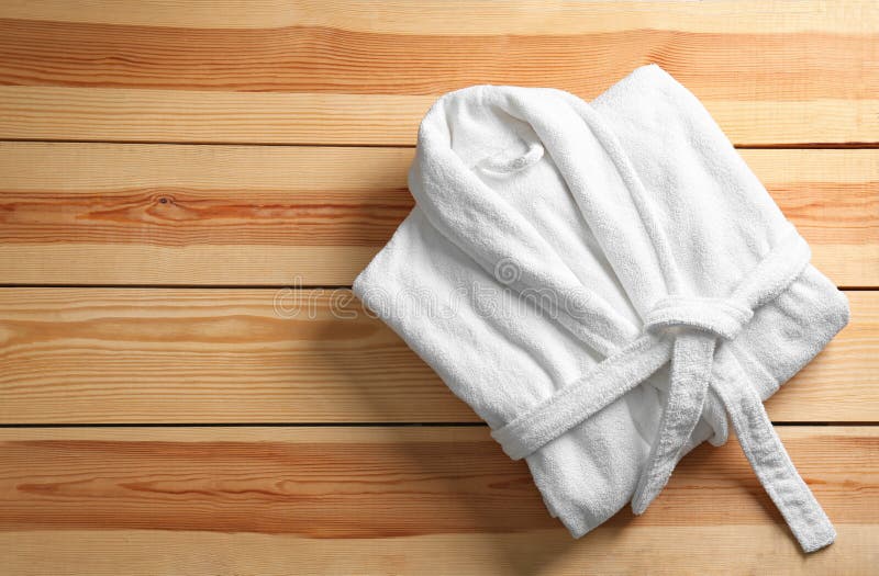 Clean Folded Bathrobe on Wood, Top View. Space for Text Stock Image ...