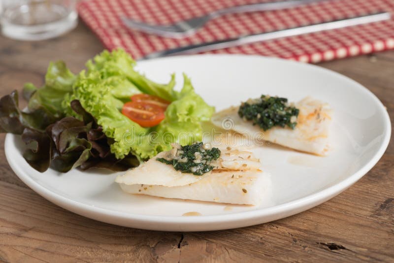 Clean Food, Fish Fillet with Basil and Garlic Sauce. Stock Image ...