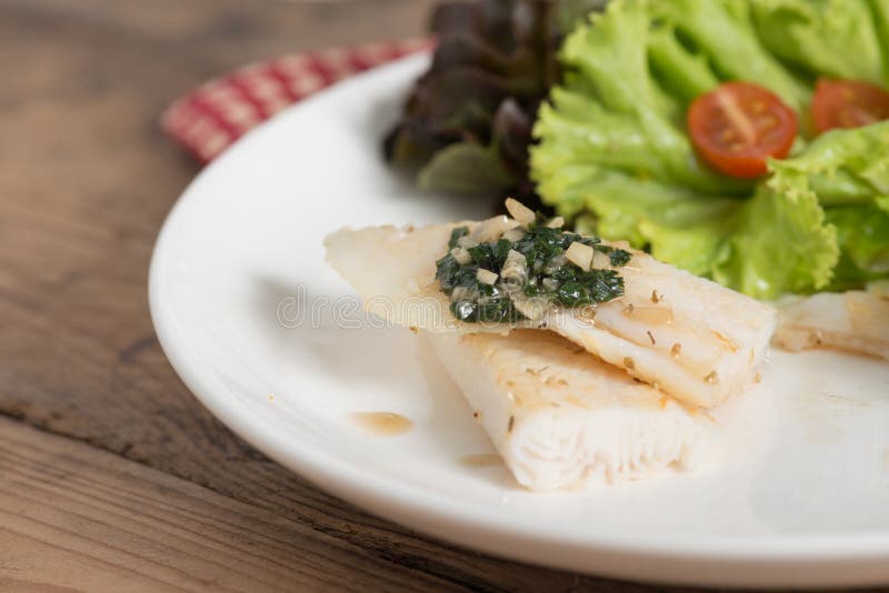Clean Food, Fish Fillet with Basil and Garlic Sauce. Stock Image ...