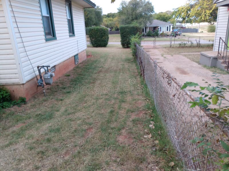 Clean freshly raked yard. stock image. Image of yard - 162031579