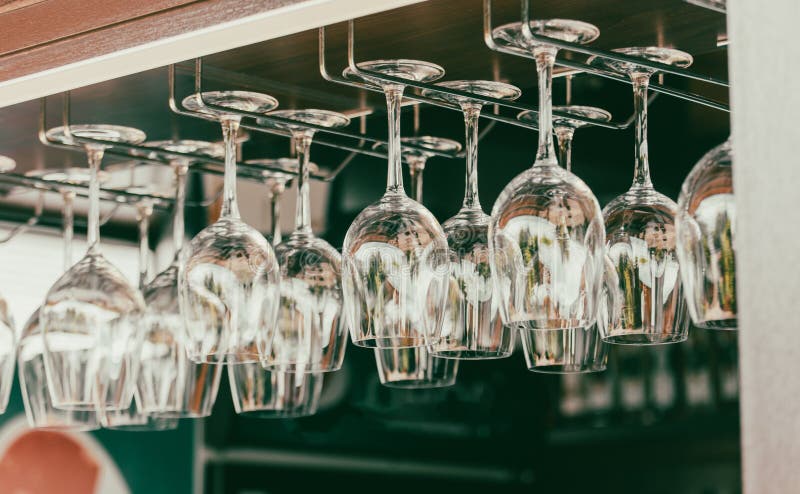 Clean Glasses Hang Over the Bar Stock Photo - Image of drink, dinner ...