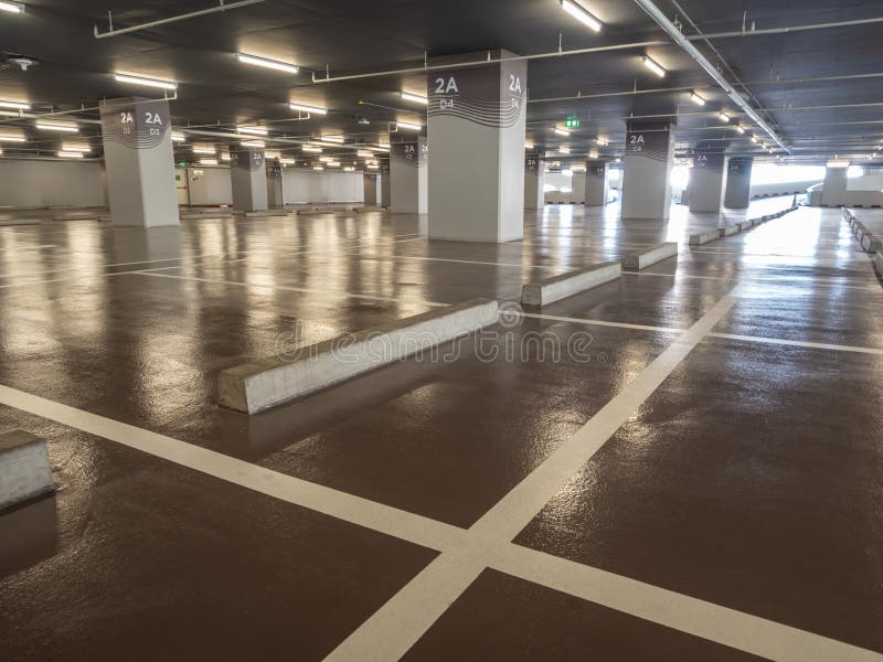 Clean and Glossy Flooring of the Parking Lot in the Parking Building ...