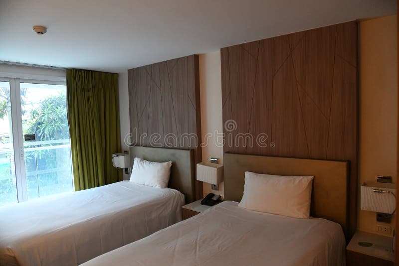 Clean hotel room stock image. Image of bedroom, lamp - 145369921