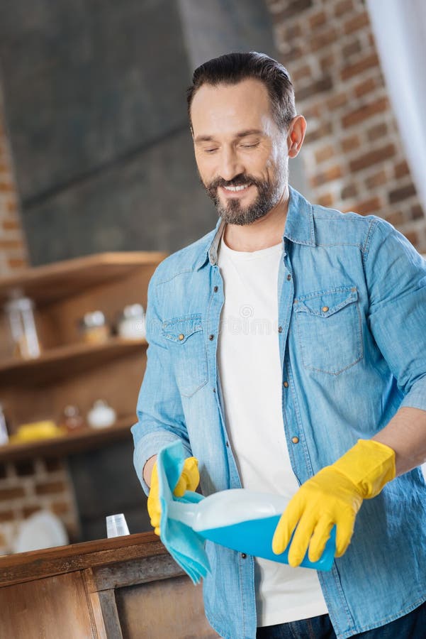 Musing Male Cleaner Utilizing Cleanser Stock Image - Image of indoors ...