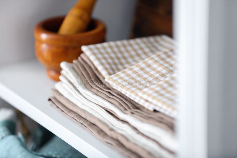 Clean Kitchen Towels on Shelf Stock Photo - Image of dishtowel, indoors ...