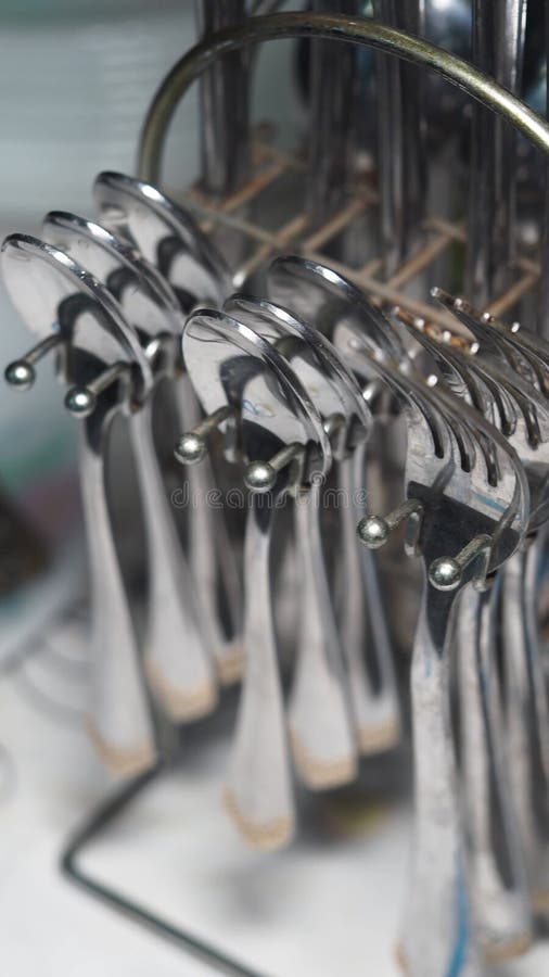 Kitchen Utensils Stored in Rack after Cleaning in Restaurant Stock ...