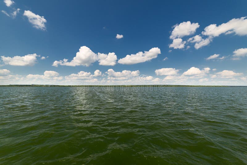Clean Lake and Beautiful Blue Sky with Clouds Stock Photo - Image of ...