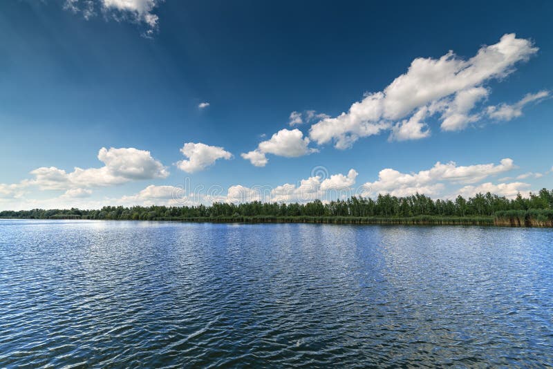 Clean Lake and Beautiful Blue Sky with Clouds Stock Image - Image of ...