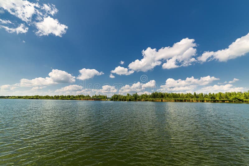 Clean Lake and Beautiful Blue Sky with Clouds Stock Photo - Image of ...
