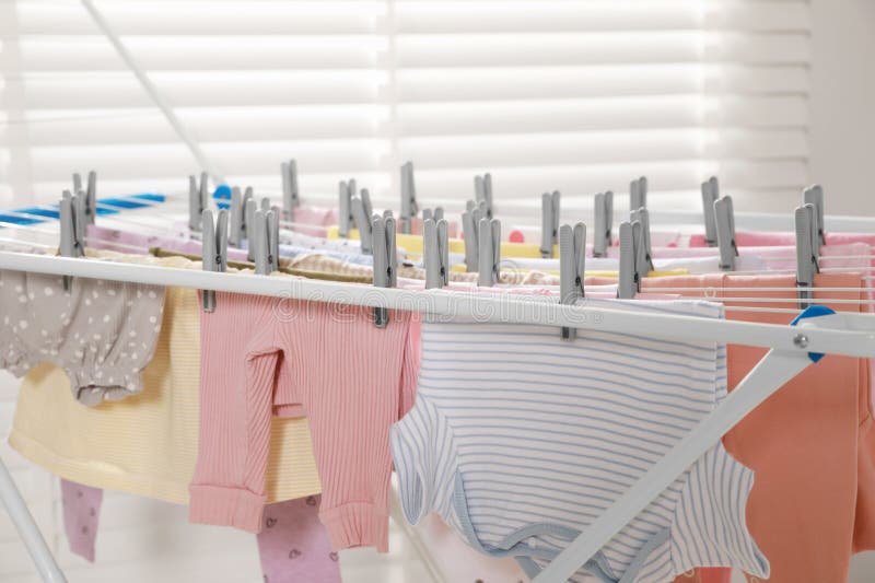 Clean Laundry Hanging on Drying Rack Indoors Stock Image - Image of ...