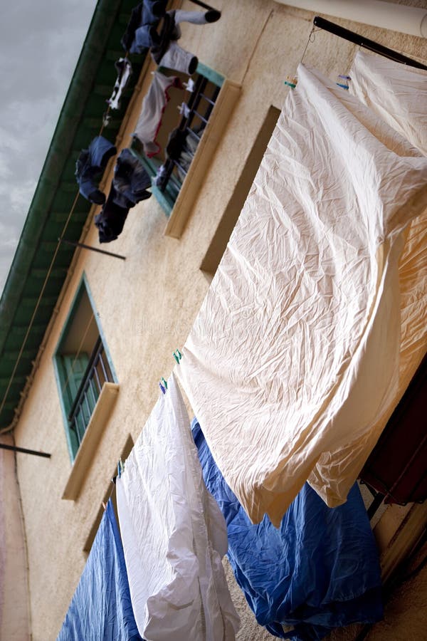 Clean laundry on a street stock photo. Image of italian - 63077256