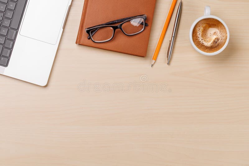 A Clean and Minimal Desk Setup Featuring a Laptop and a Coffee Cup ...