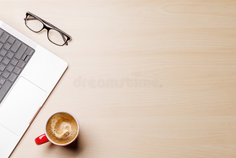 A Clean and Minimal Desk Setup Featuring a Laptop and a Coffee Cup ...