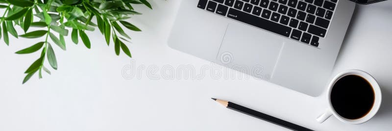 A Clean and Minimal Workspace Featuring a Laptop Pencil and a Cup of ...