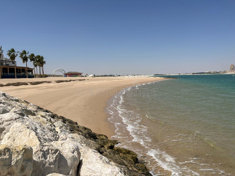 Clean and Modern Sandy Beach in Doha Stock Photo - Image of yellow ...