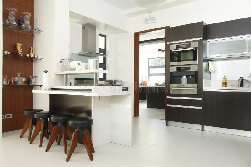 Clean and Neat Modern Kitchen in an Asian Home Stock Image - Image of ...