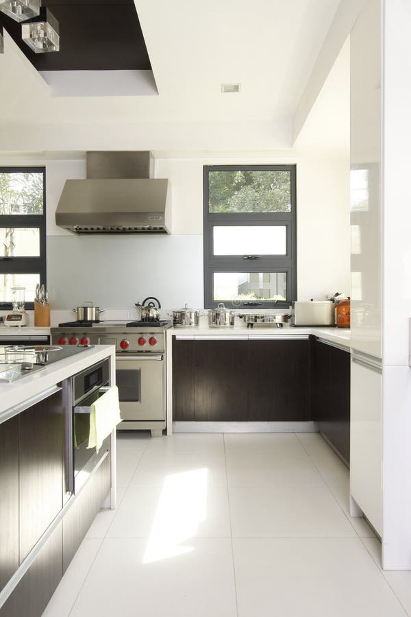 Clean and Neat Modern Kitchen in an Asian Home Stock Photo - Image of ...