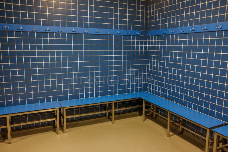 Clean and Organized Pool Changing Room with Seating Stock Photo - Image ...