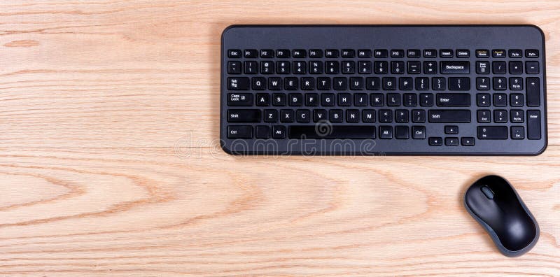 Clean and Organized Red Oak Desktop with Keyboard and Mouse Stock Photo ...