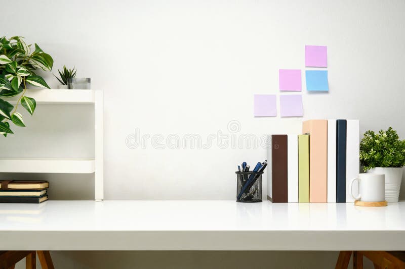 Clean and Organized Workspace with Books, Stationery, and Decorative ...