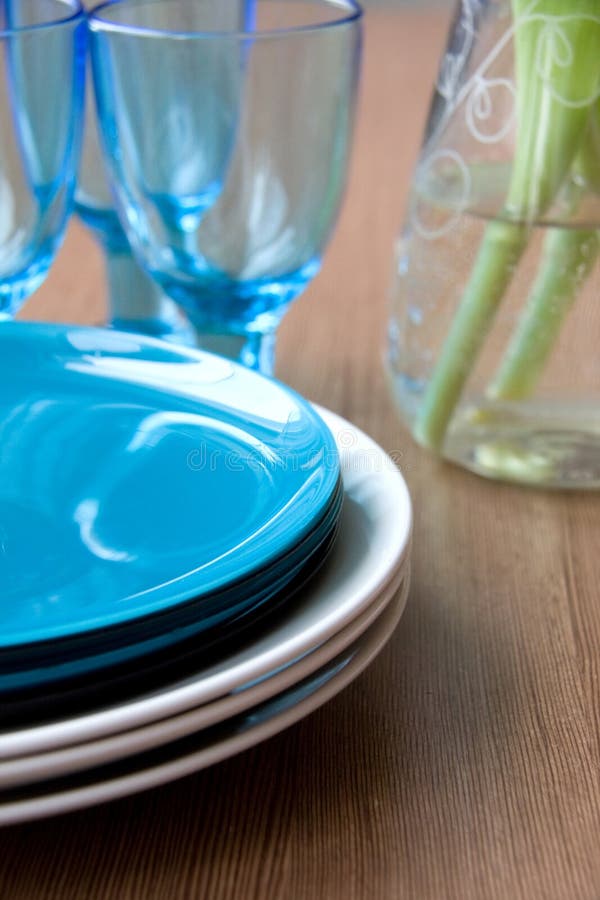 Clean Plates on Table stock photo. Image of dish, shiny - 8748512